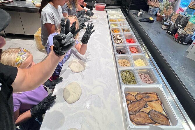 Pizza cooking class in real Pizzeria with Pizza chef & Tour guide - Authentic Experiences & Reviewer Insights