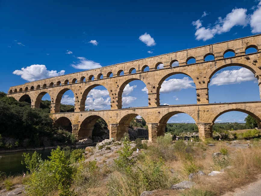 Pont du Gard against clear blue sky Roman architectural marvel