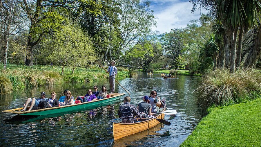 Punting through the Christchurch Botanic Gardens stretch of the Avon