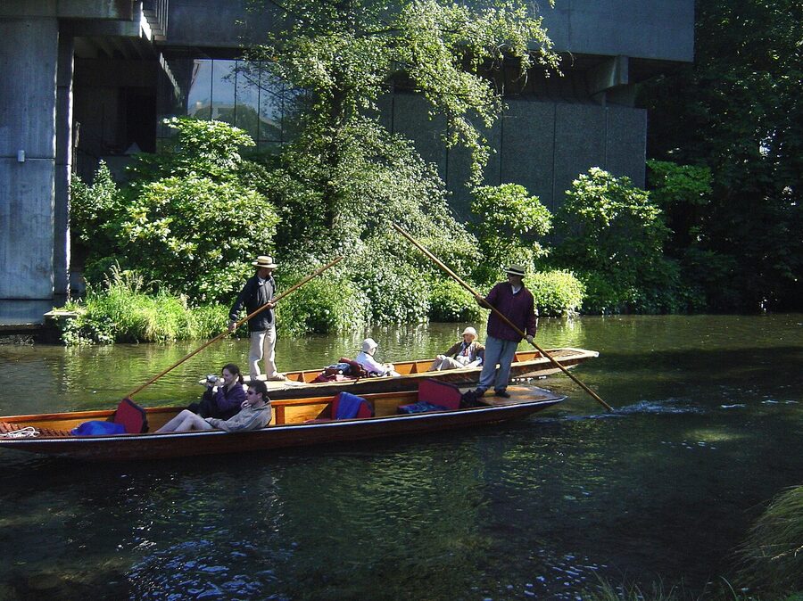Two punts passing on the Avon River in Christchurch