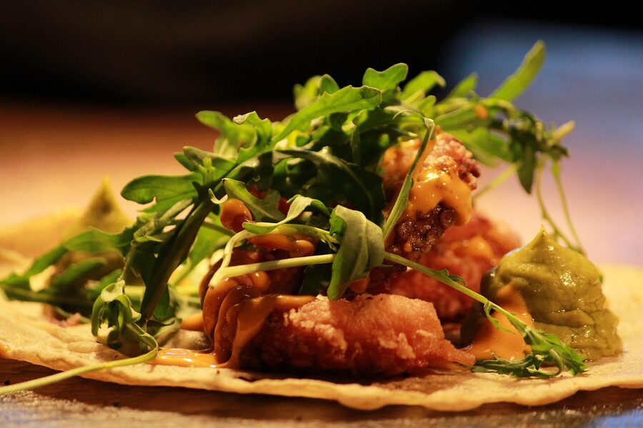 Octopus taco with sauce in a Mexican restaurant