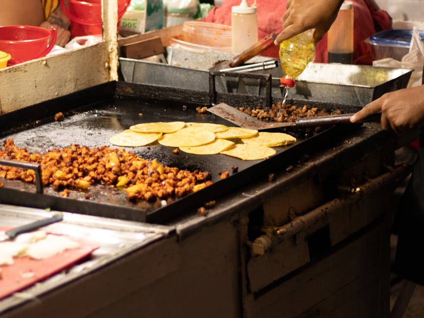 Evening taco preparation at a Puerto Vallarta food stand
