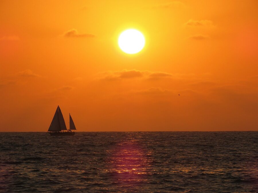 Puerto Vallarta sunset with sailboat on the bay
