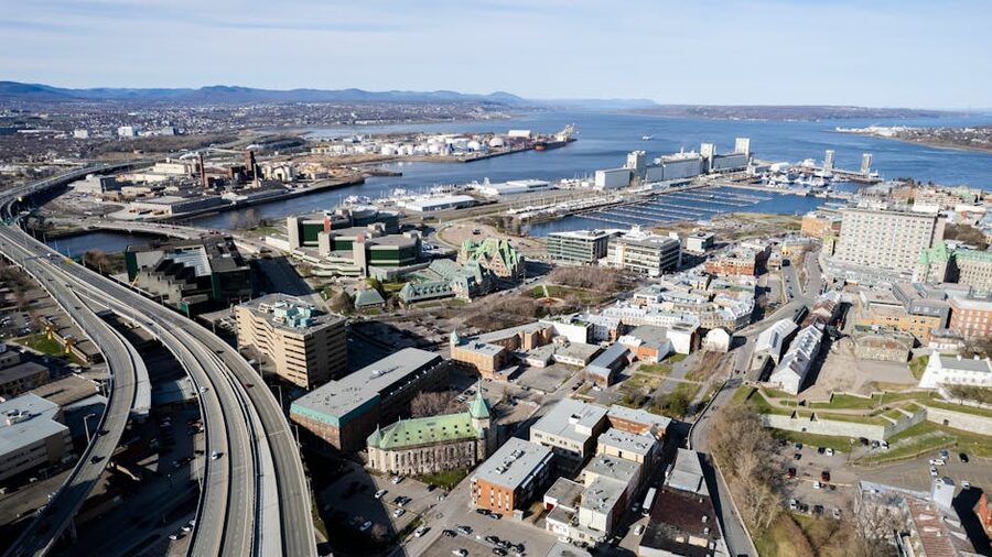Aerial view of Quebec City skyline and the St Lawrence River with cruise vessels in the harbor