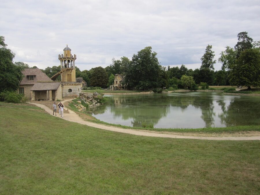 Queen's Hamlet at Versailles with Marlborough Tower and the artificial pond