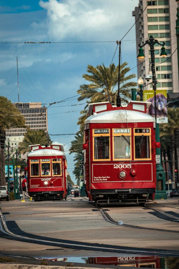 Iconic red streetcars on Canal Street in New Orleans