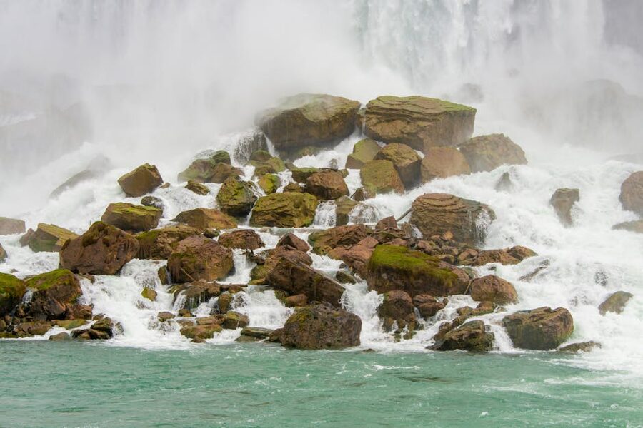 Moss-covered rocks at the base of American Falls USA