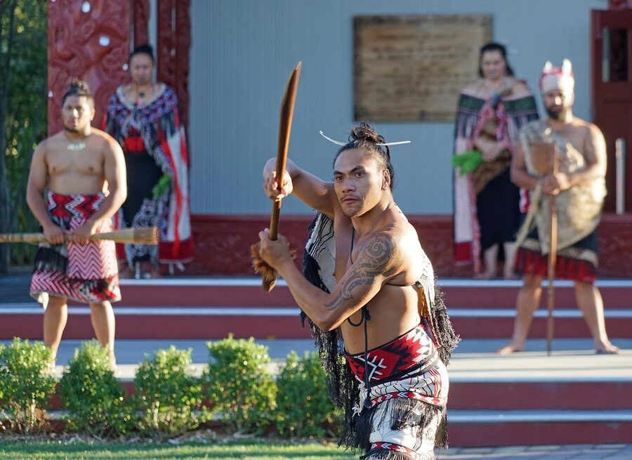 Maori warrior with traditional moko painted face in Rotorua