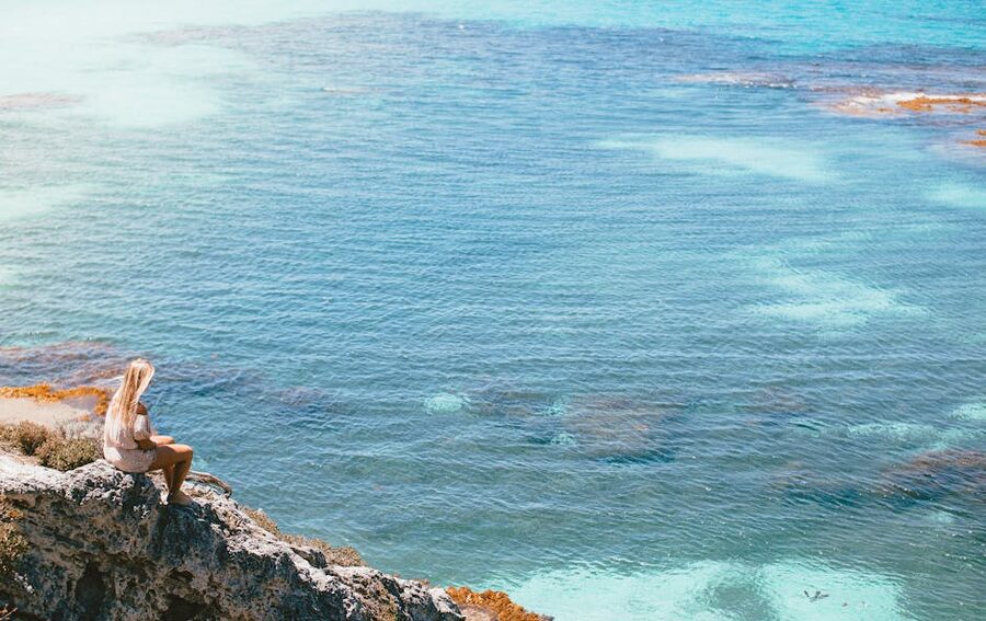 Sitting on a Rottnest cliff with ocean view