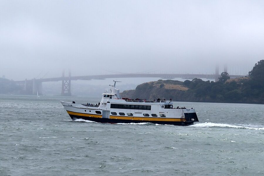 Royal Star cruise boat and foggy Golden Gate Bridge from a Sausalito ferry