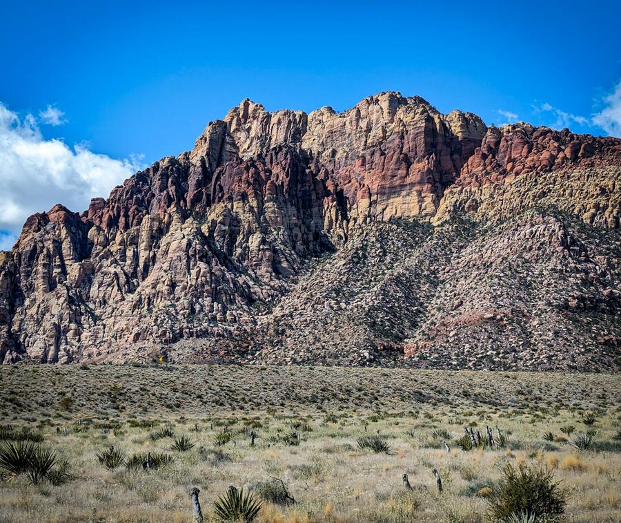 Red Rock Canyon geological formations under clear blue sky