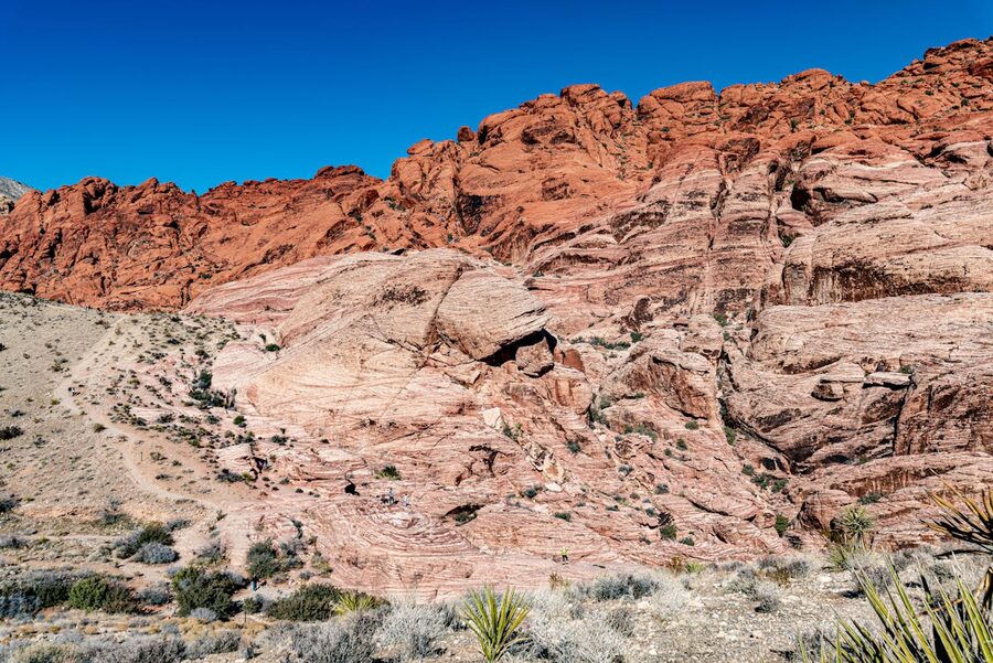 Layered rock formations at Red Rock Canyon under clear sky