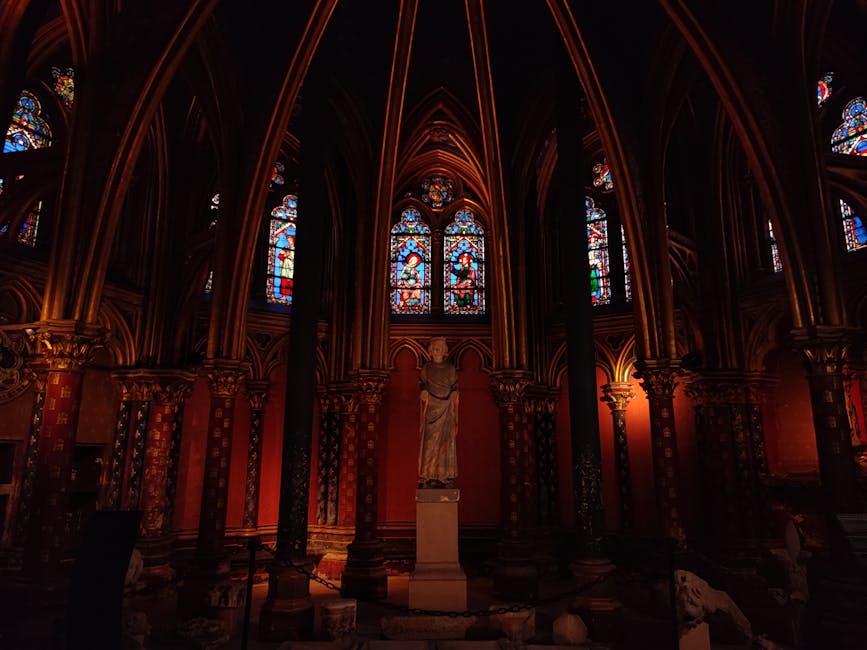 Sainte-Chapelle statue and stained glass interior Paris