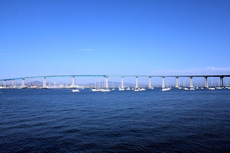 Coronado Bridge with sailboats in San Diego Bay
