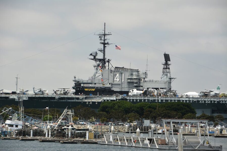 USS Midway Museum with aircraft and American flag flying