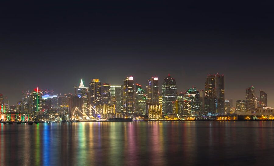San Diego downtown skyline at night reflected in calm water