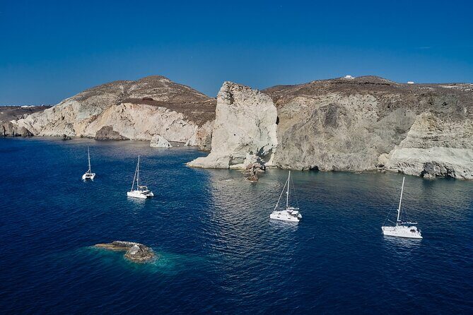 Santorini: Luxury Catamaran Cruise with Fresh Fish BBQ & Drinks - What Sets This Tour Apart