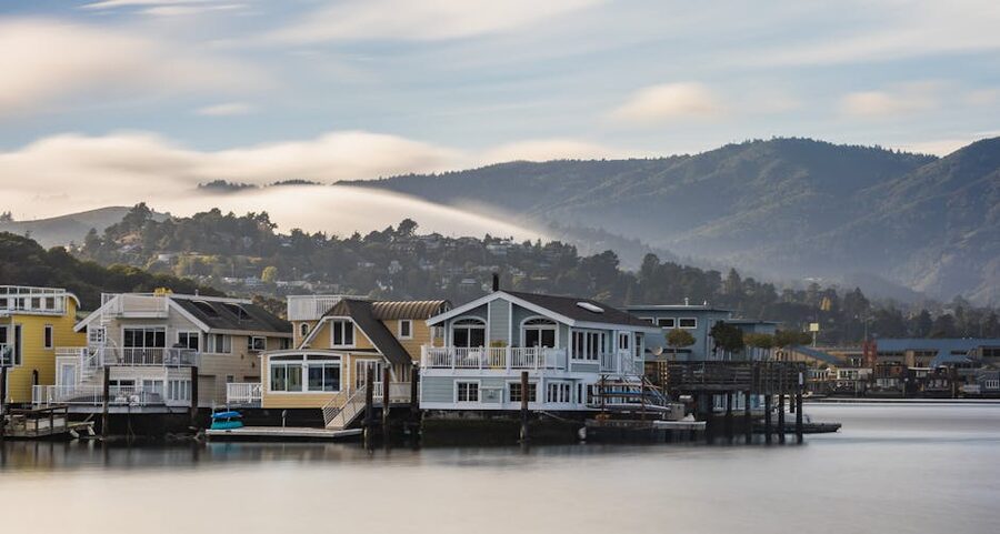 Sausalito houseboats at sunrise with mountain backdrop