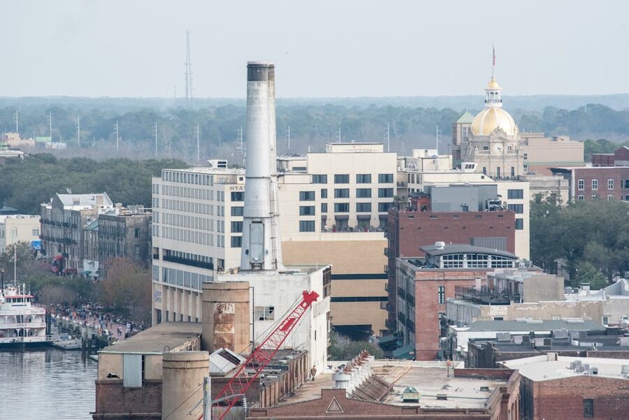 Aerial view of Savannah historic district with river in background
