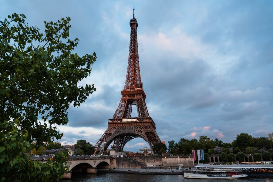 Eiffel Tower over the Seine River at sunset