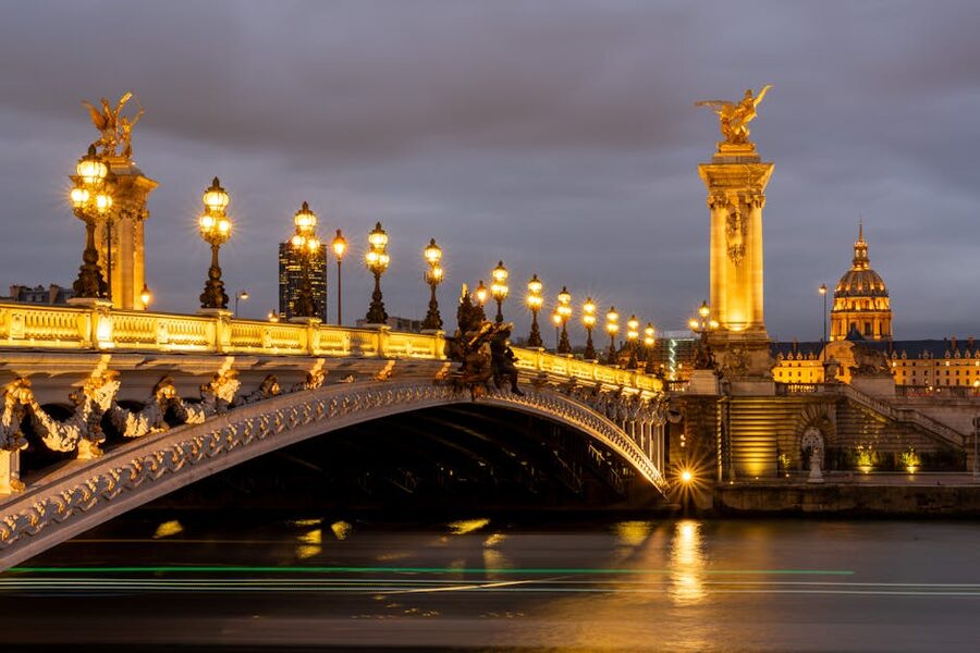 Pont Alexandre III at night illuminated in Paris