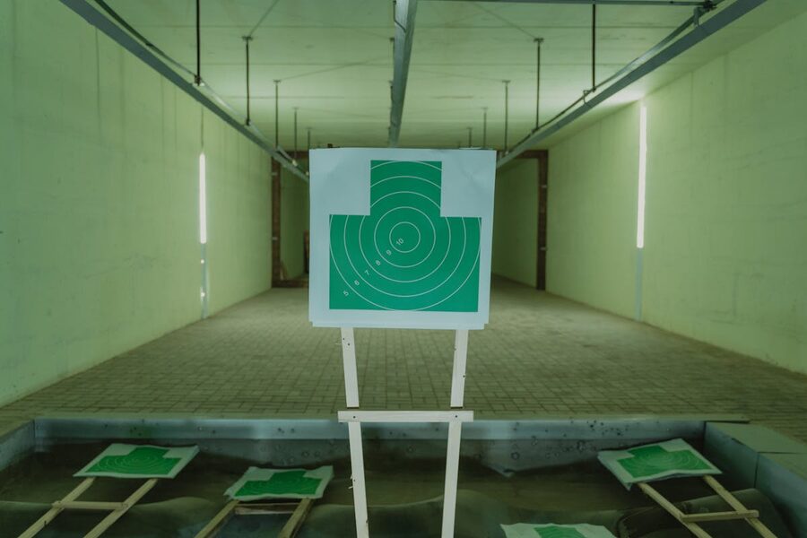 Green target at indoor shooting range for aiming practice