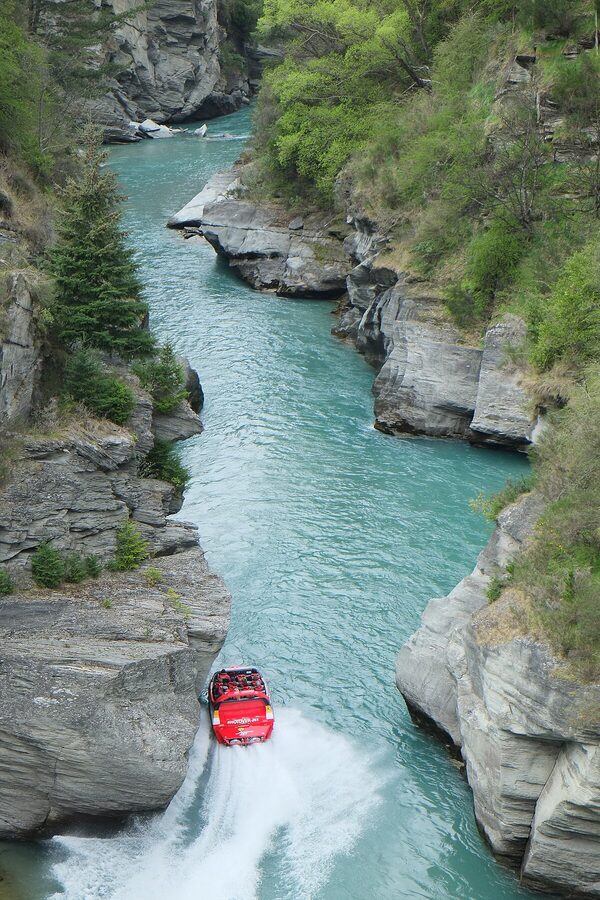 Shotover Jet boat racing into the canyon at Arthur's Point