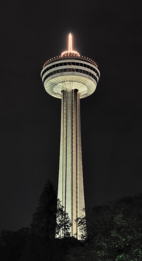 Skylon Tower illuminated at night on the Canadian side of Niagara Falls