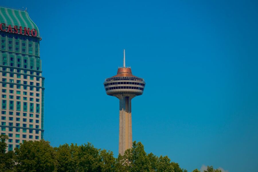 Skylon Tower above Niagara Falls Ontario against blue sky