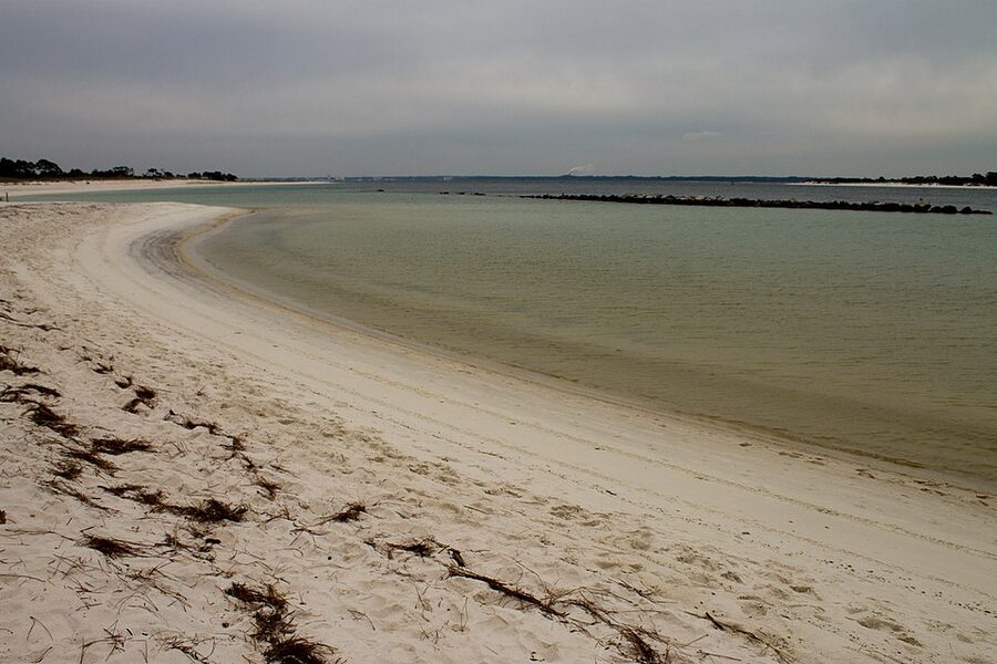 The inlet at St Andrews State Park with Panama City Beach in the background