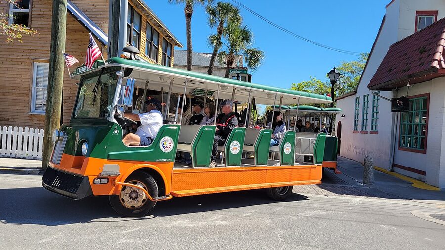 Old Town Trolley on Cordova Street passing Flagler College