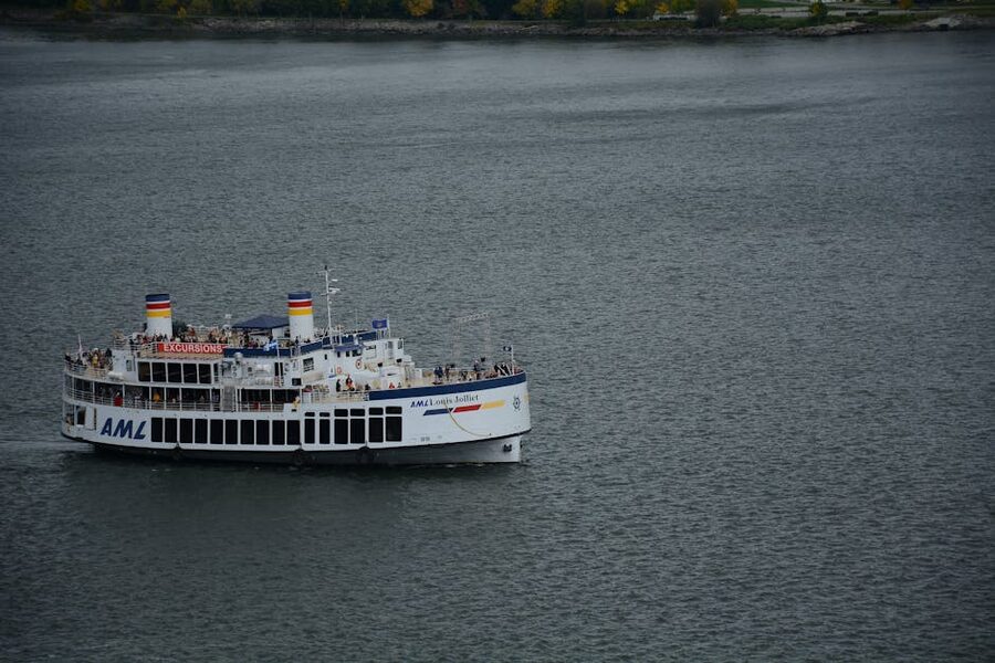 Passenger vessel cruising the St Lawrence River near Quebec City