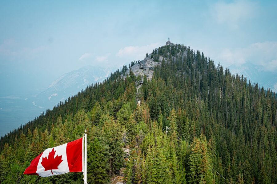 Winter view of Sulphur Mountain with Canadian flag