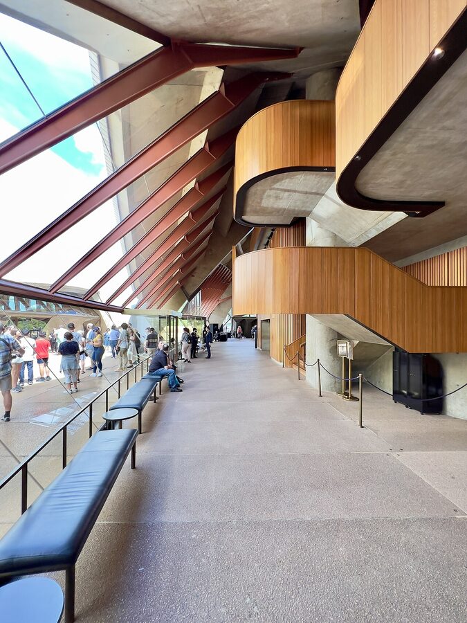Tour group walking through Sydney Opera House foyer