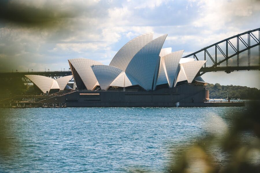 Sydney Opera House with the Harbour Bridge from across the cove