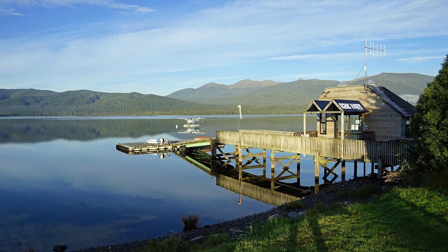 Lake Te Anau in early morning with mist rising off the water