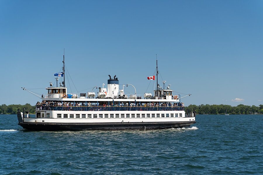Toronto Island ferry departing with the city skyline behind
