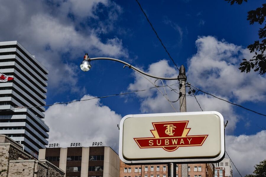 Toronto subway sign on a street corner