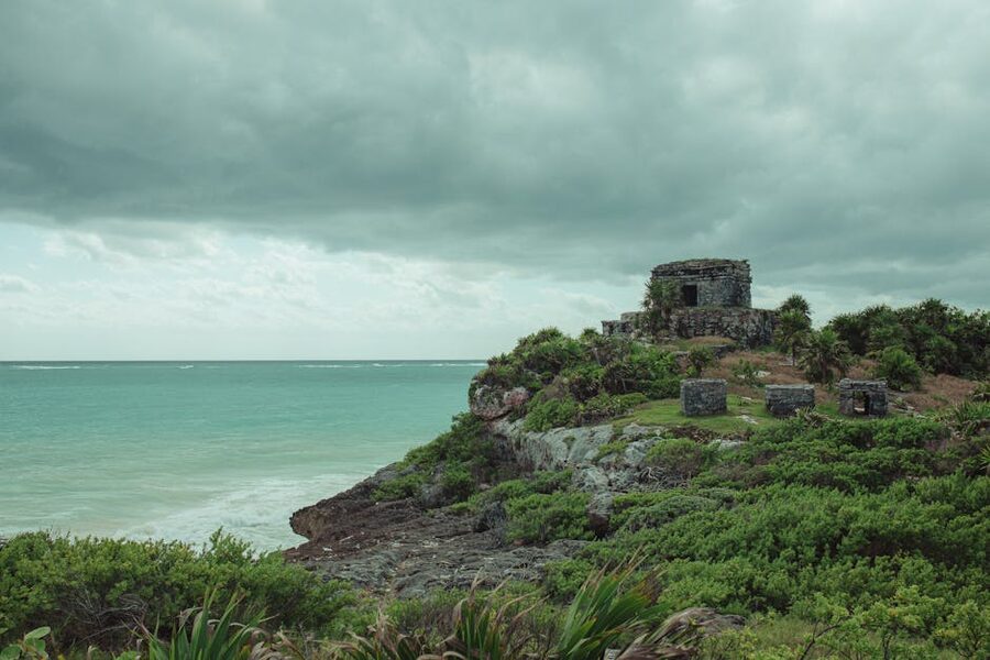 Tulum ruins with dramatic sky over Caribbean Sea