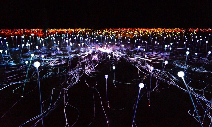 Field of Light Uluru glowing spheres at ground level