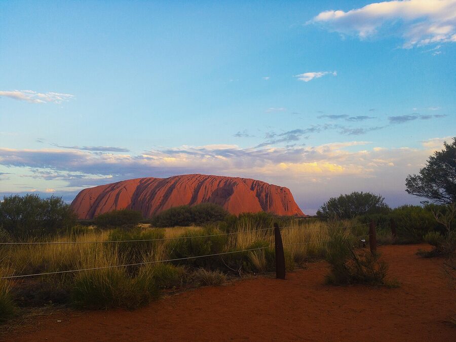 Uluru in deep orange light at sunset