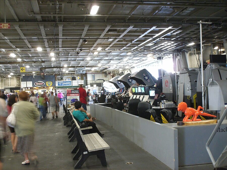 Flight simulators set up on the USS Midway hangar deck