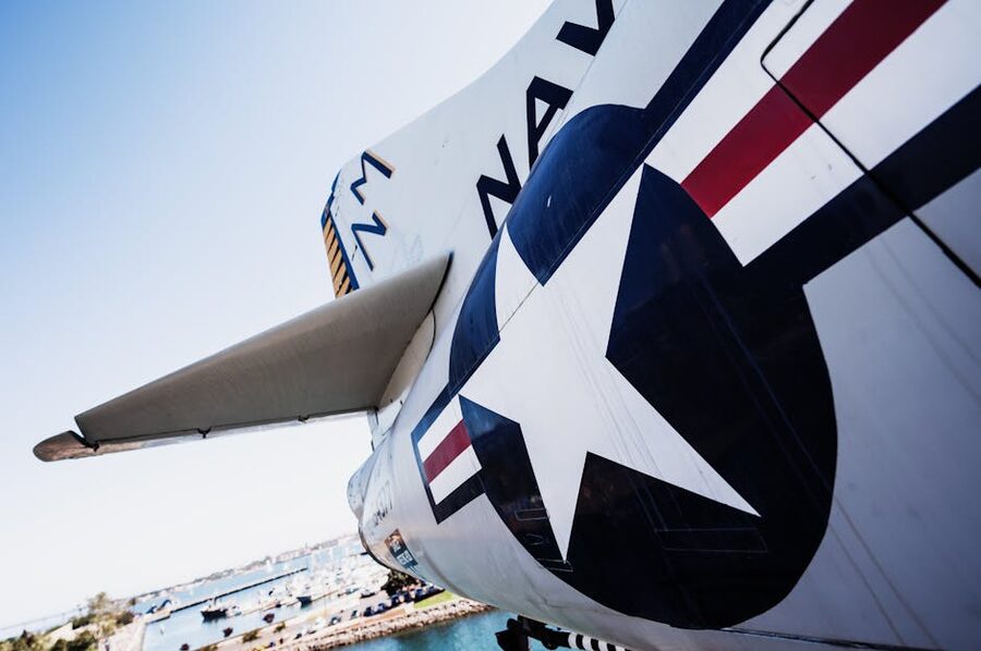Close-up of Navy fighter jet wing with star emblem at USS Midway Museum