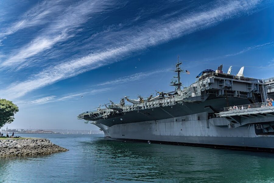 USS Midway Museum aircraft carrier docked at Navy Pier in San Diego on a clear day