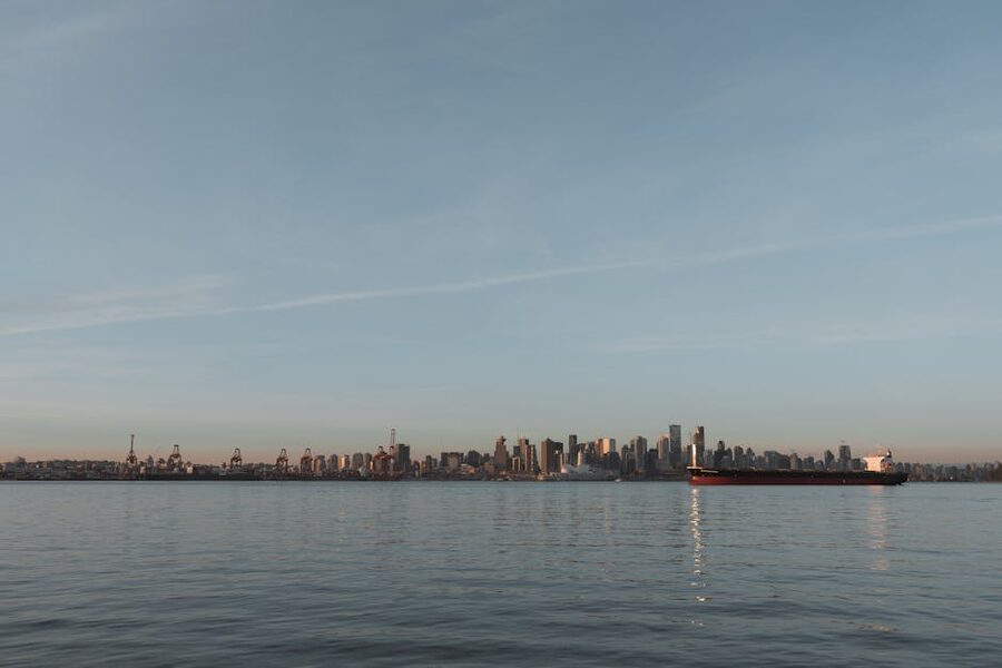 Vancouver skyline viewed from the water with a ship
