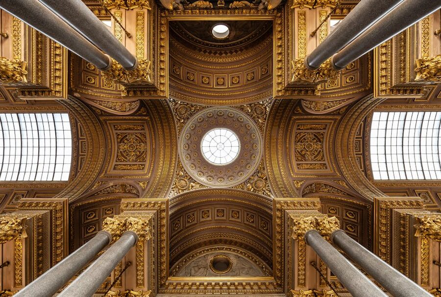 Ornate ceiling inside Versailles castle