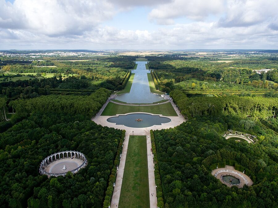 Aerial view of the Palace of Versailles and gardens from Paris day trip