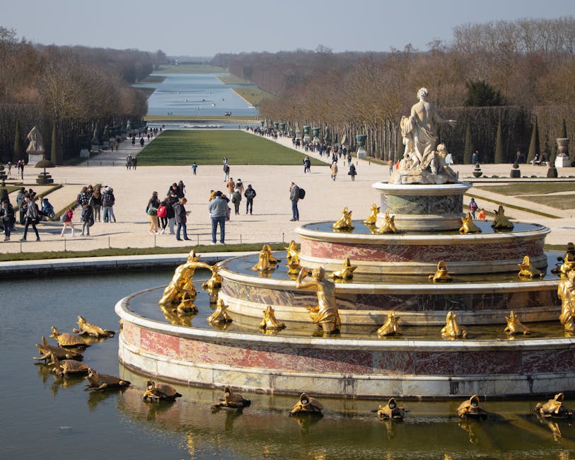 Gilded fountain sculpture at Versailles gardens