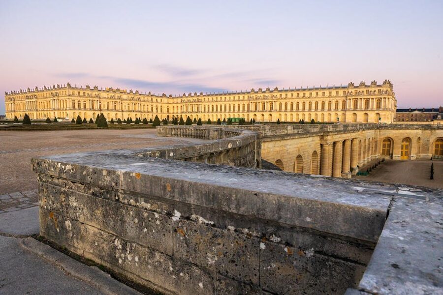 Versailles palace at sunset highlighting architecture