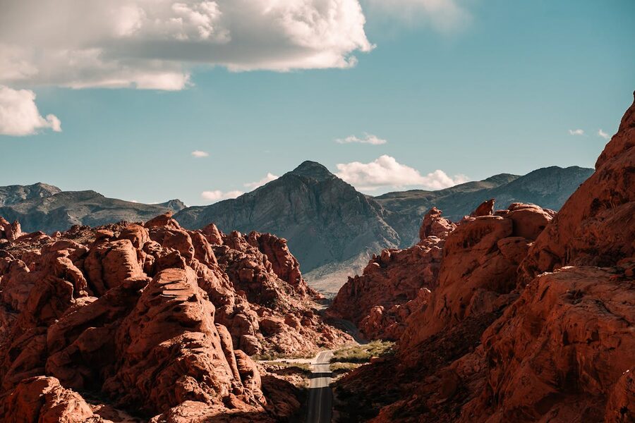 Red rock formations in Moapa Valley Nevada under bright sky